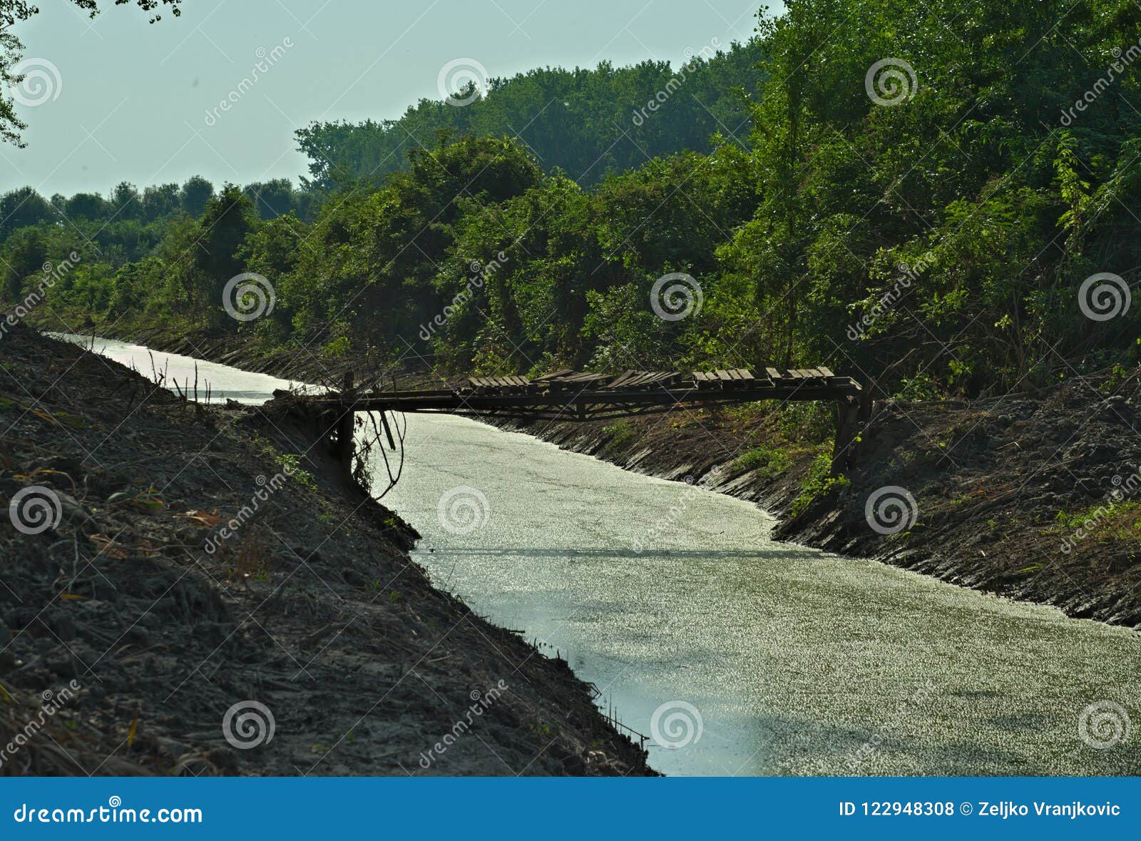 Rustic and Dangerous Bridge Over Small River Stock Photo - Image of ...