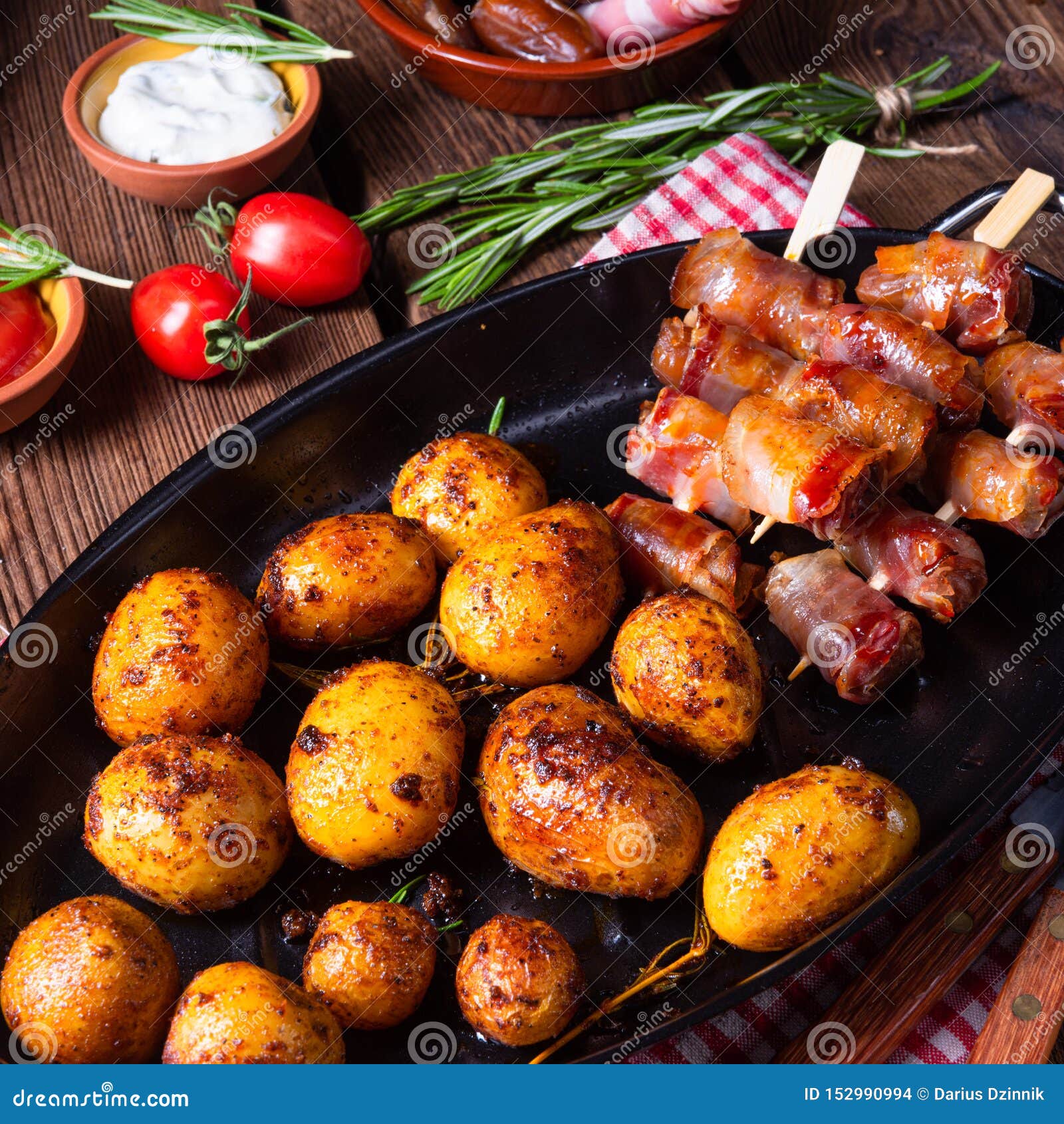 Rustic Dates Wrapped in Bacon and Young Roasted Potato Stock Photo ...
