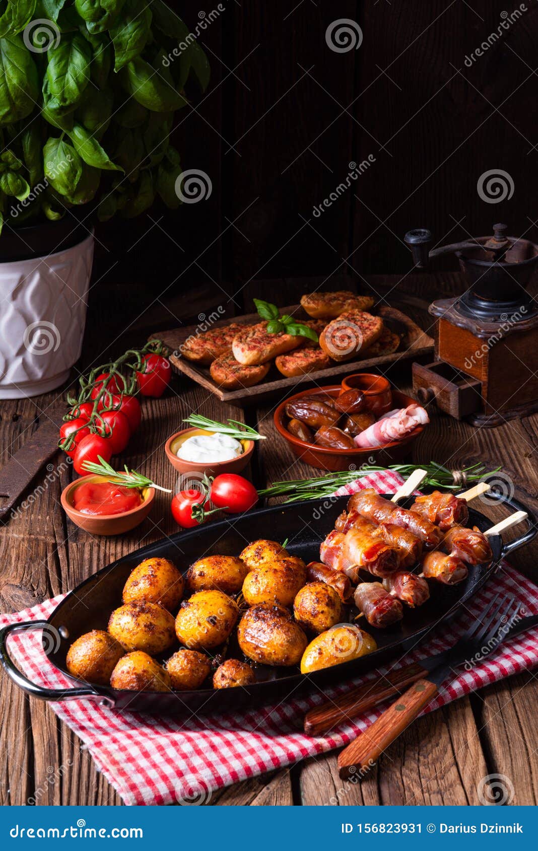 Rustic Dates Wrapped in Bacon and Young Roasted Potato Stock Image ...