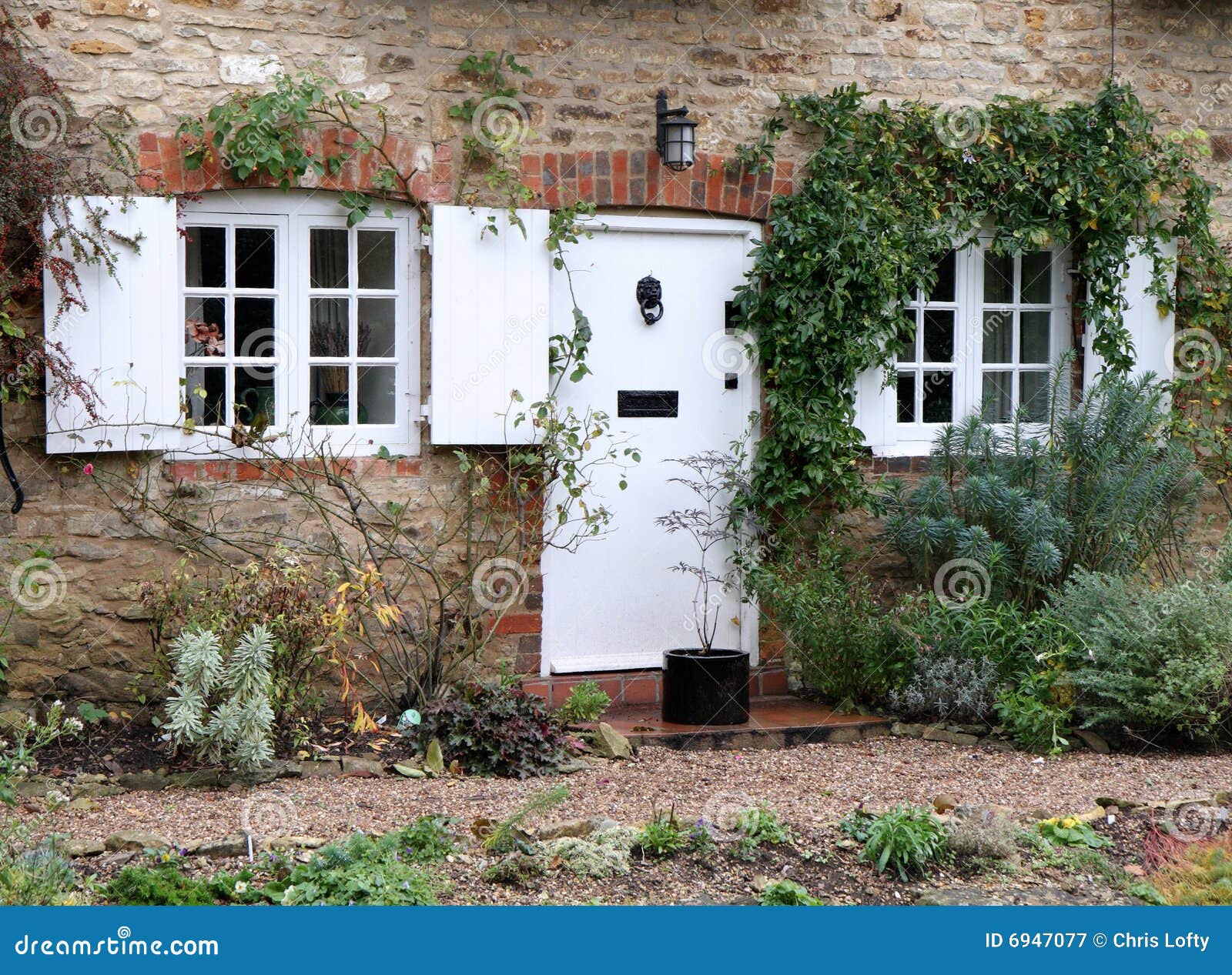 Rustic English Village Cottage Stock Image - Image of shutters ...