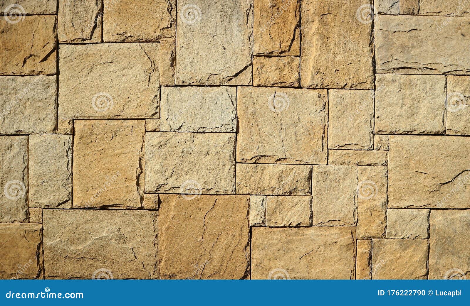 Rustic Exterior Wall Made from Brown Flat Natural Stones of Different ...