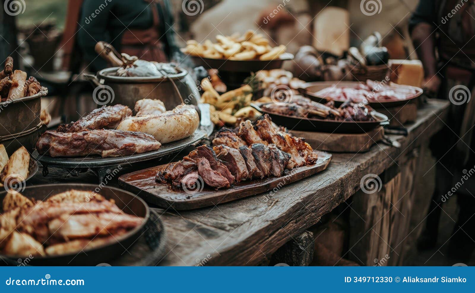 Rustic Feast Displayed with Roasted Meats on a Medieval Wooden Table ...