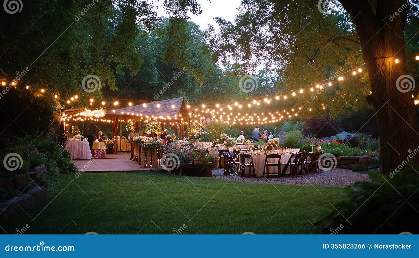 A Rustic Garden Wedding with Wildflower Centerpieces and String Lights ...