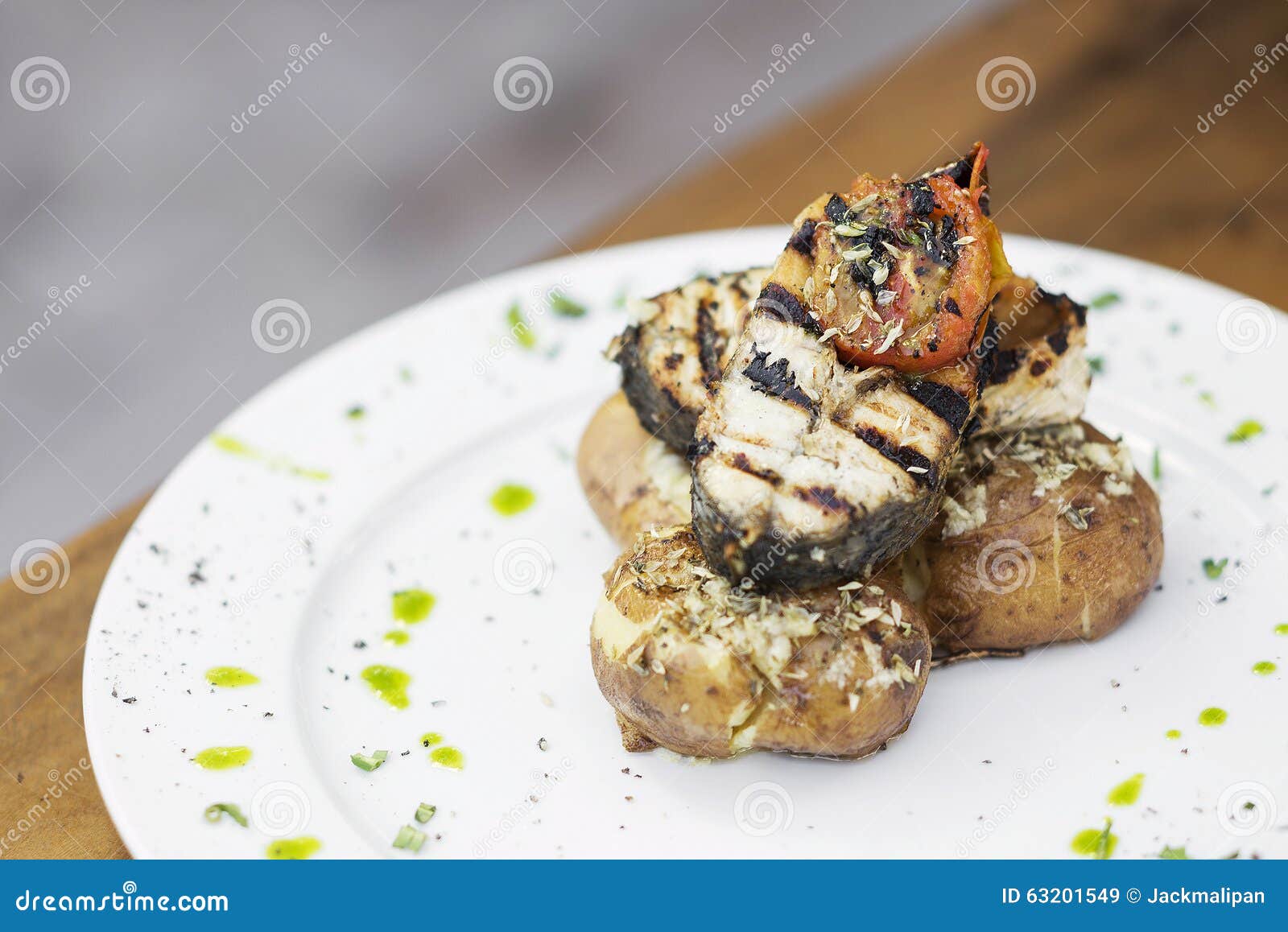 Rustic Grilled Fish with Roast Potato and Tomato Stock Image - Image of ...