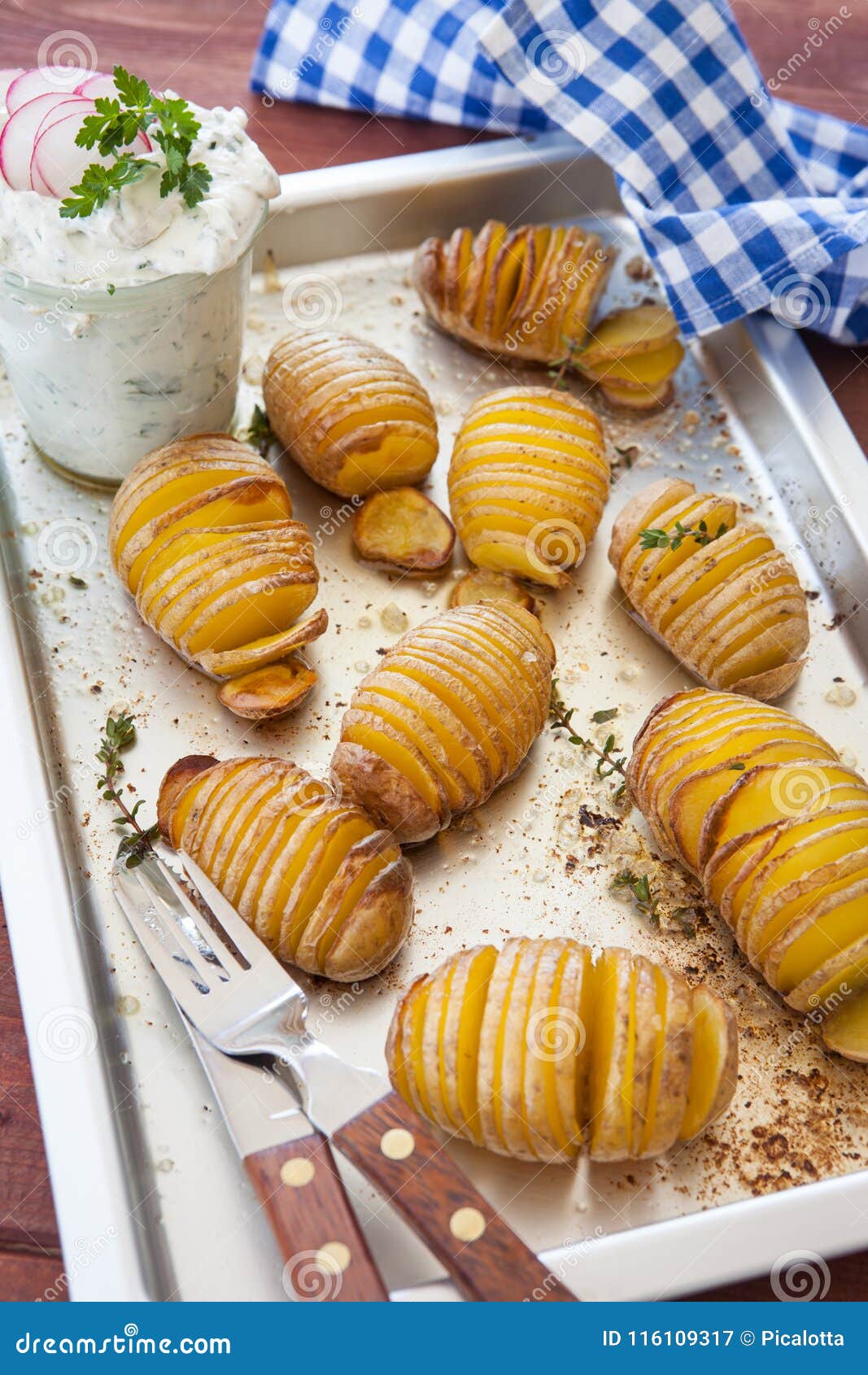 Rustic hasselback potatoes stock image. Image of sour - 116109317