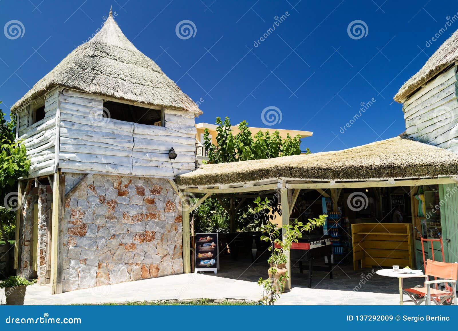 Rustic hotel stock image. Image of table, roof, patio - 137292009