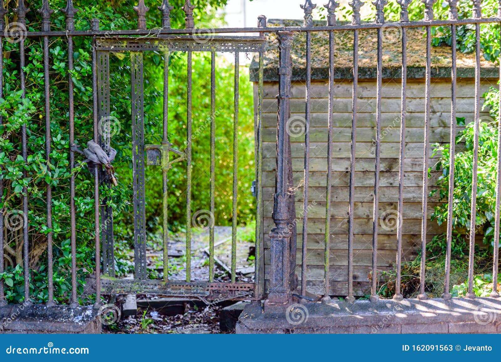 Rustic Iron Fence Door Gate To Typical British Backyard in England ...