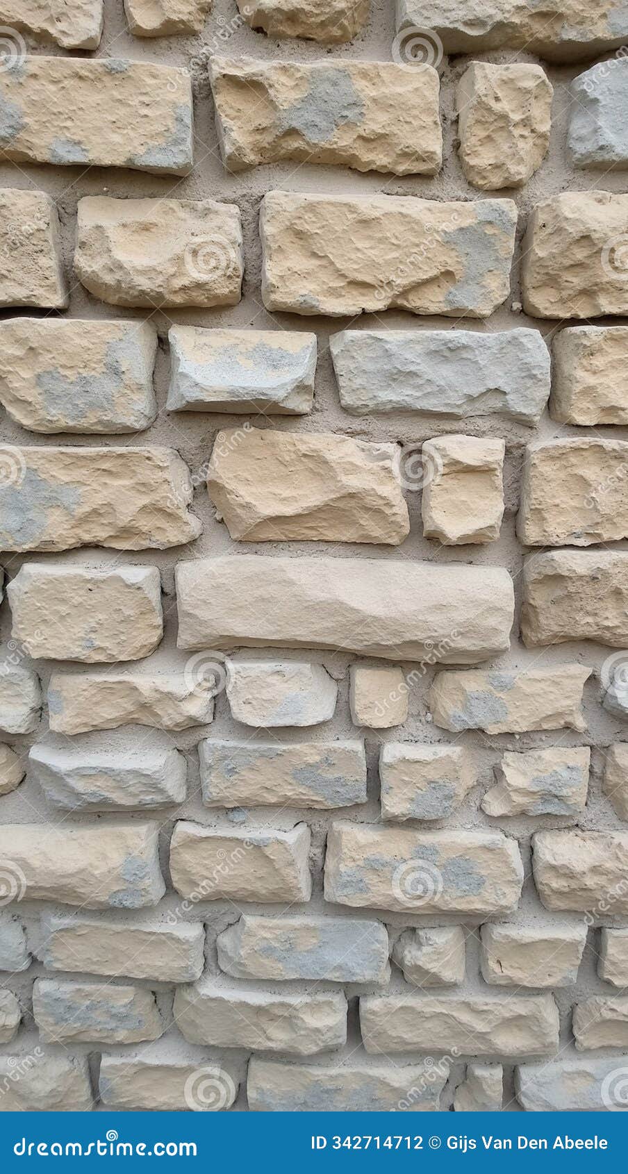 Rustic Limestone Wall in Soft Beige and Gray Hues with Irregular Shapes ...