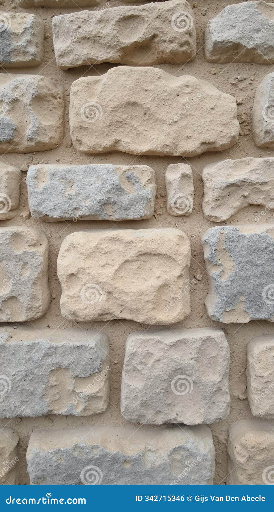 Rustic Limestone Wall in Soft Beige and Gray Hues with Irregular Shapes ...