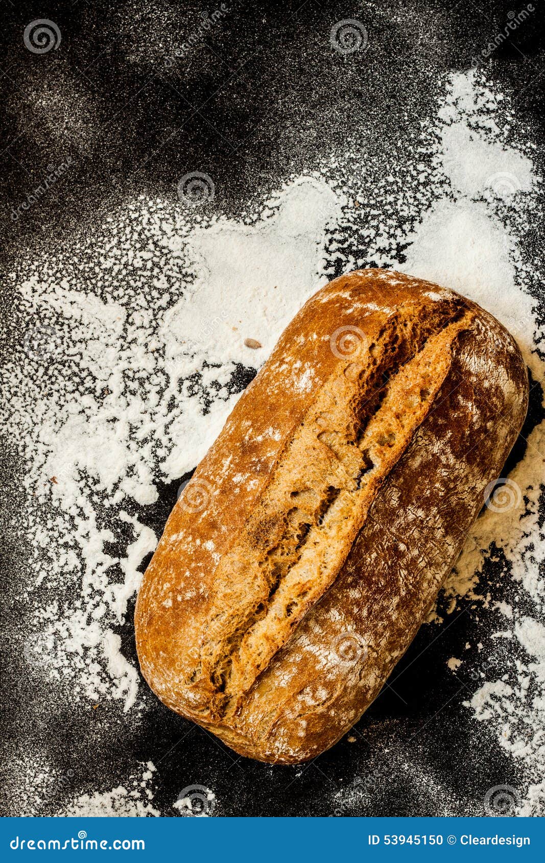 Rustic Loaf of Bread and Flour on Black Chalkboard from Above Stock ...