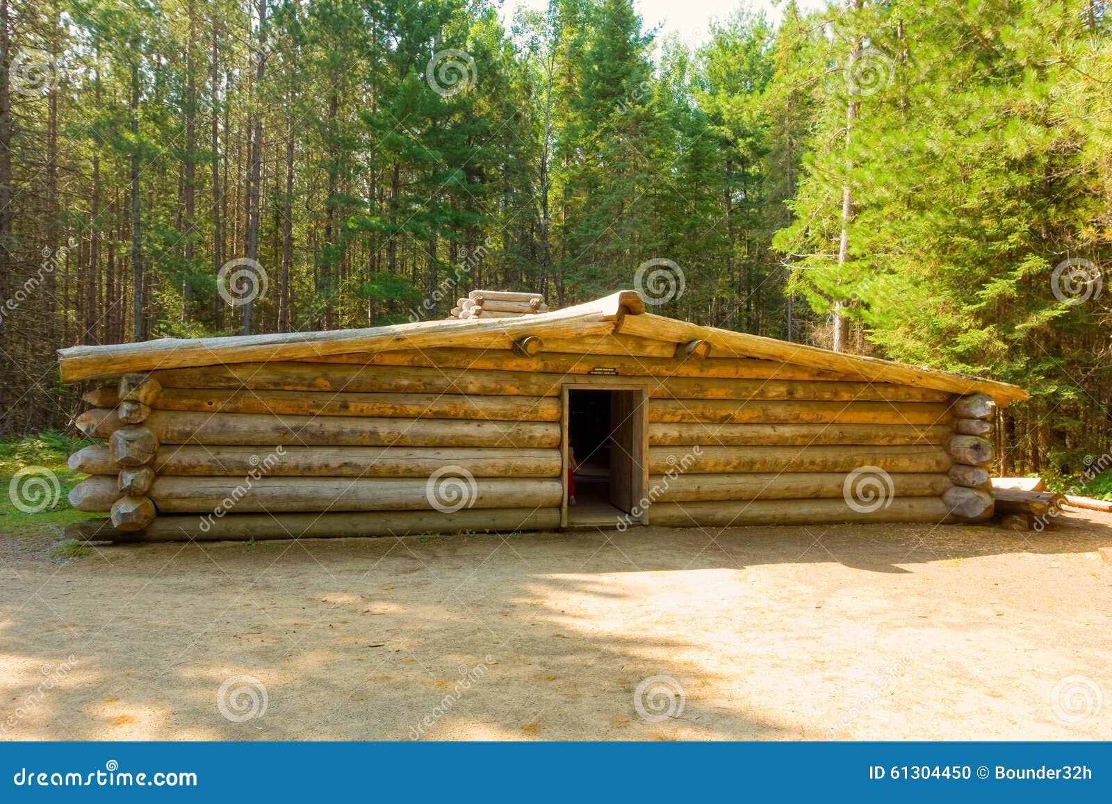 A Rustic Log Dwelling in a Forest Stock Photo - Image of construction ...