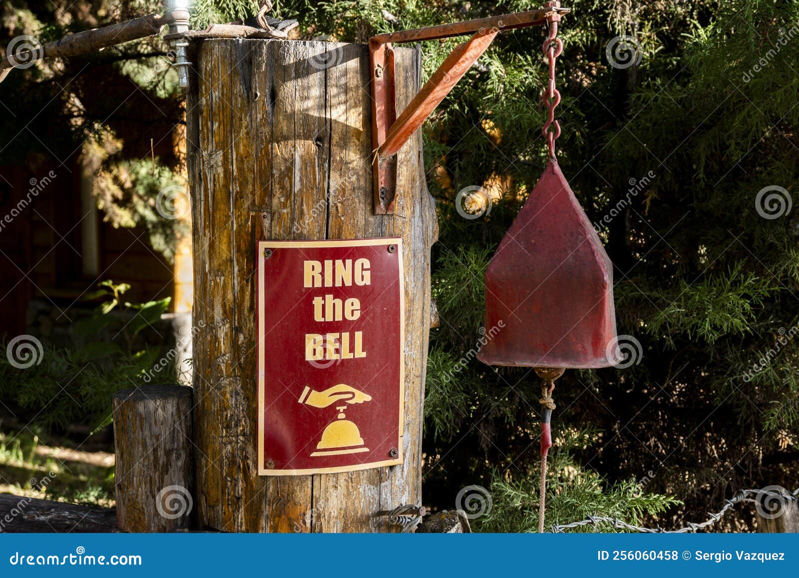 Rustic Metal Bell Hung with a Sign that Says "ring the Bell Stock Photo ...
