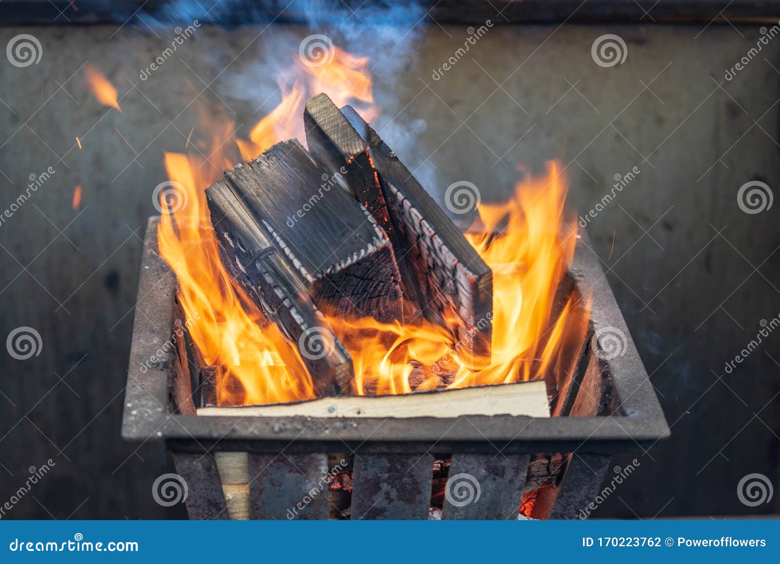 Rustic Metal Fire Basket.Burning Fire Basket Stock Photo - Image of ...