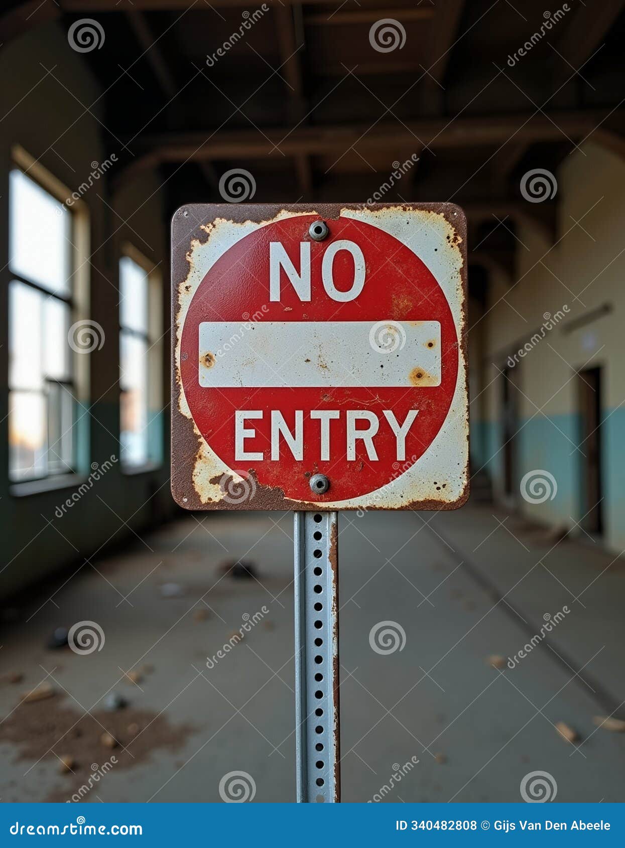 Rustic No Entry Metal Sign Against Deserted Warehouse Backdrop Stock ...