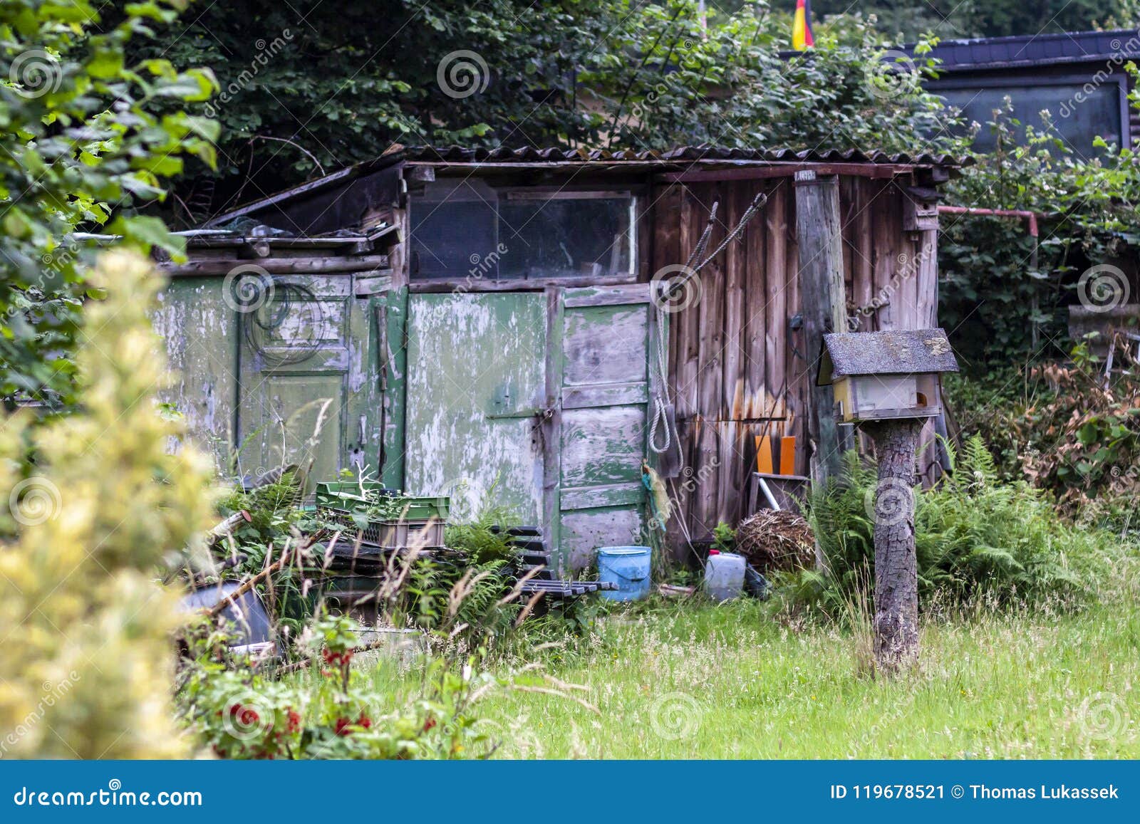 Rustic Old Garden Shed in Typical German Garden Stock Image - Image of ...
