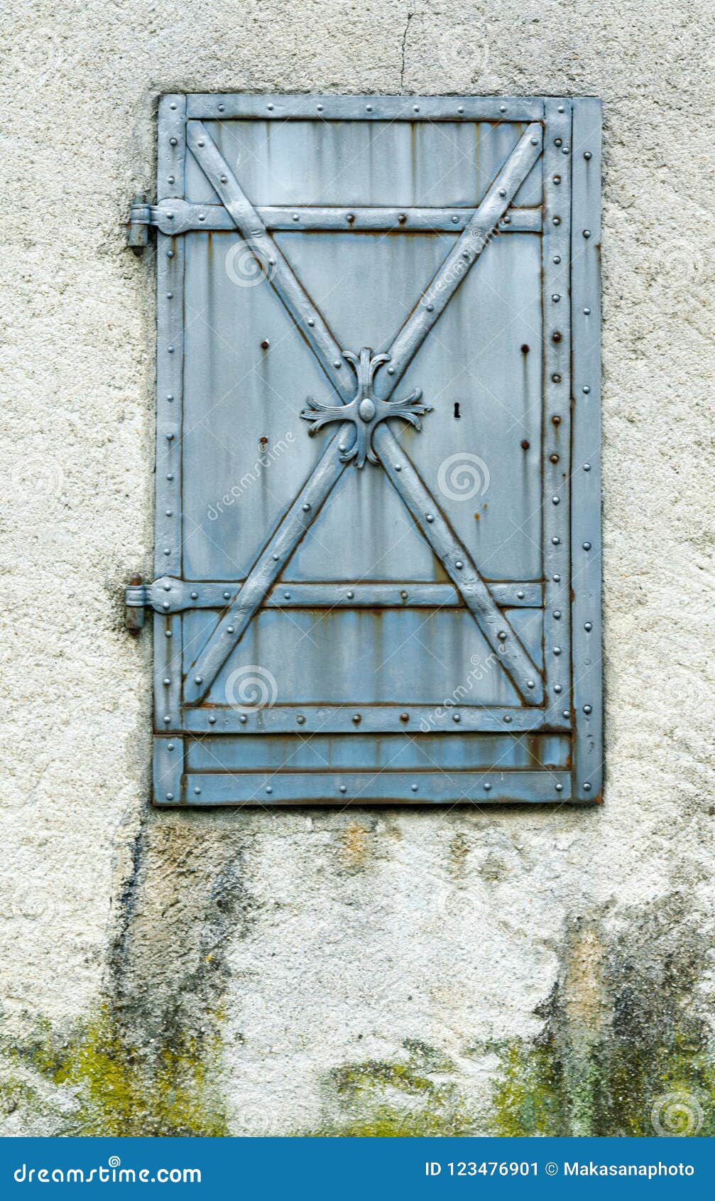 Rustic Old Metal Window Shutter on an Old House Front Stock Image ...