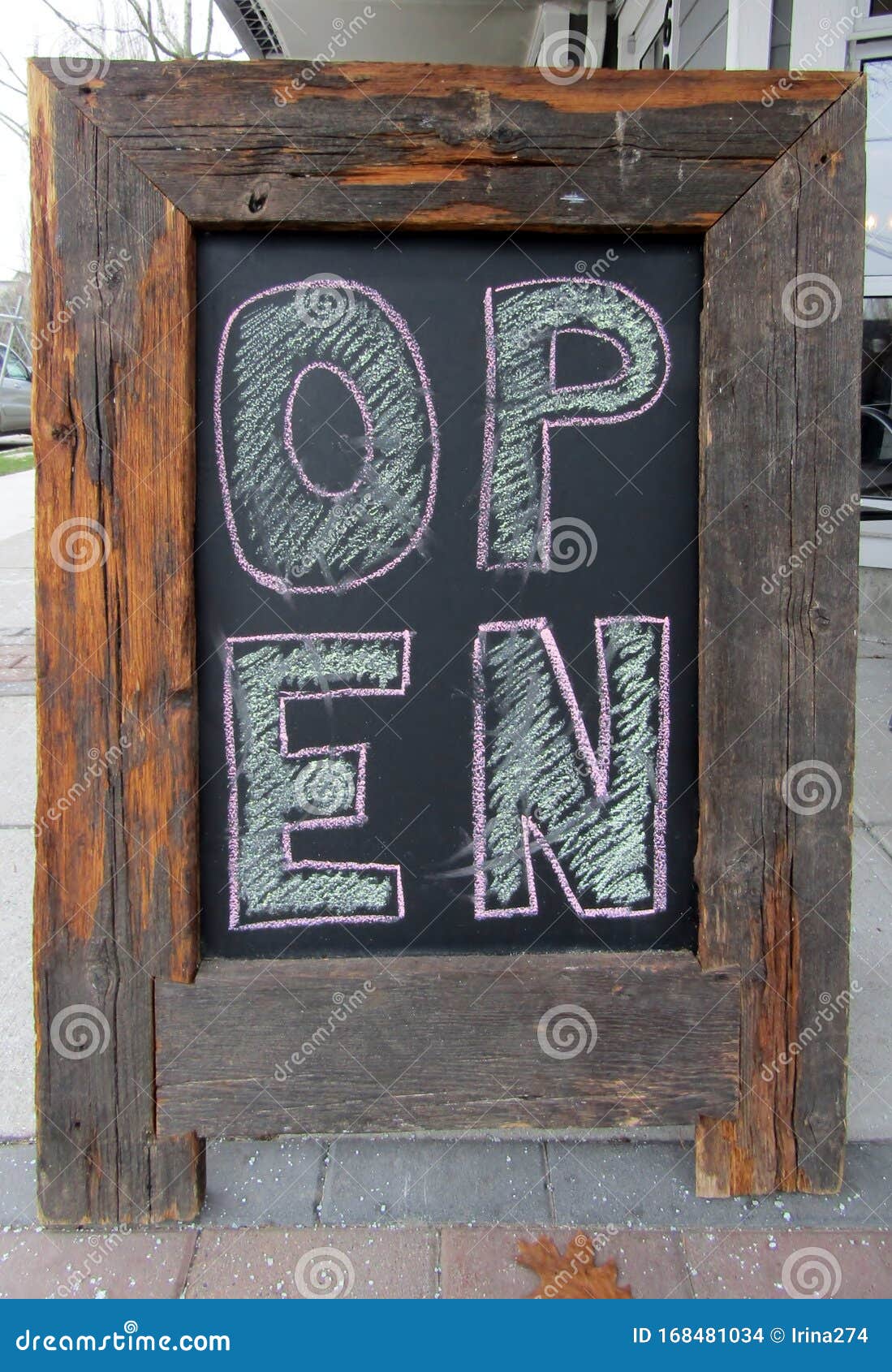 Rustic Open Sign Standing on a Sidewalk Stock Photo - Image of business ...