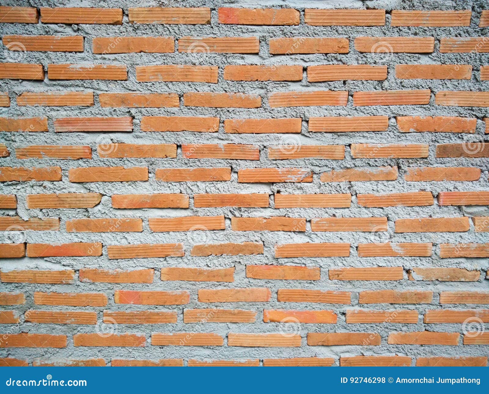Rustic Orange Brick Wall Background with Cement Paste. Stock Photo ...