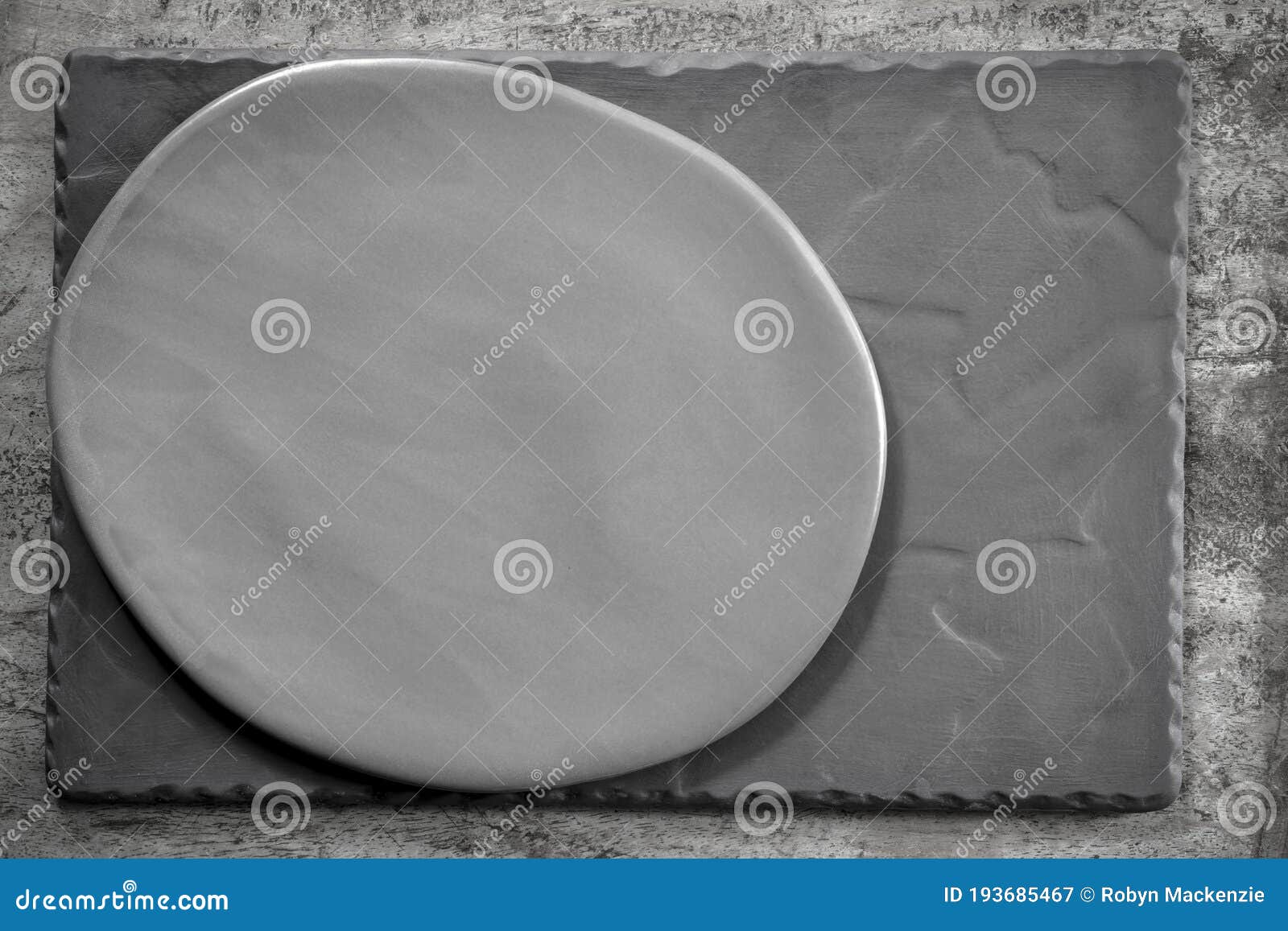 Rustic Oval Gray Plate Over Slate Top View Stock Image - Image of gray ...