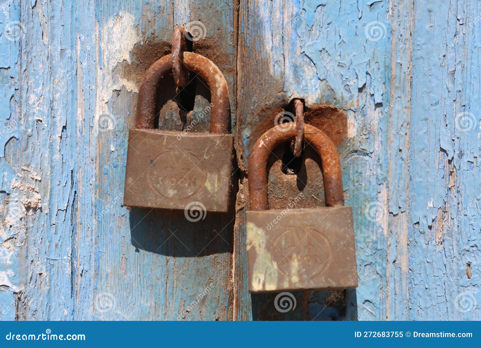 Rustic Padlock is Securely Fastened Onto a Wooden Door, with Distressed ...