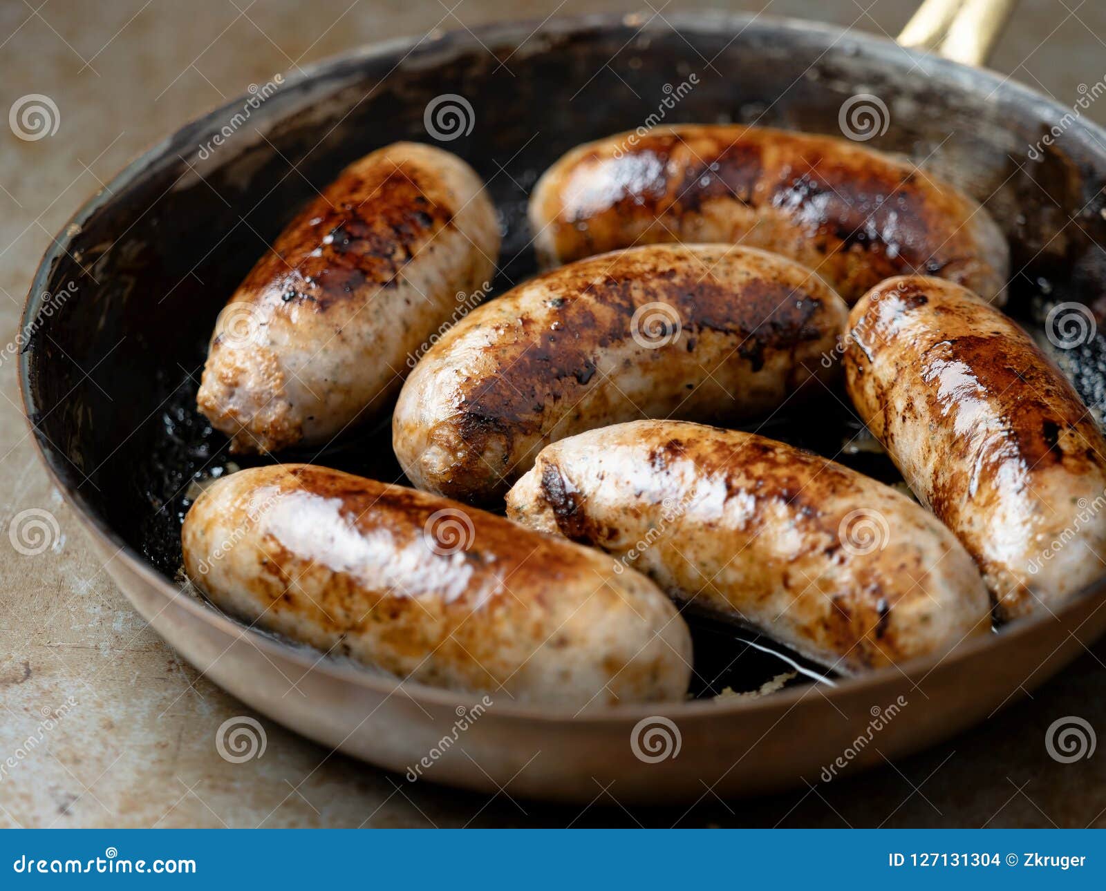 Rustic Pan Roasted Sausages Stock Photo - Image of cholesterol, protein ...