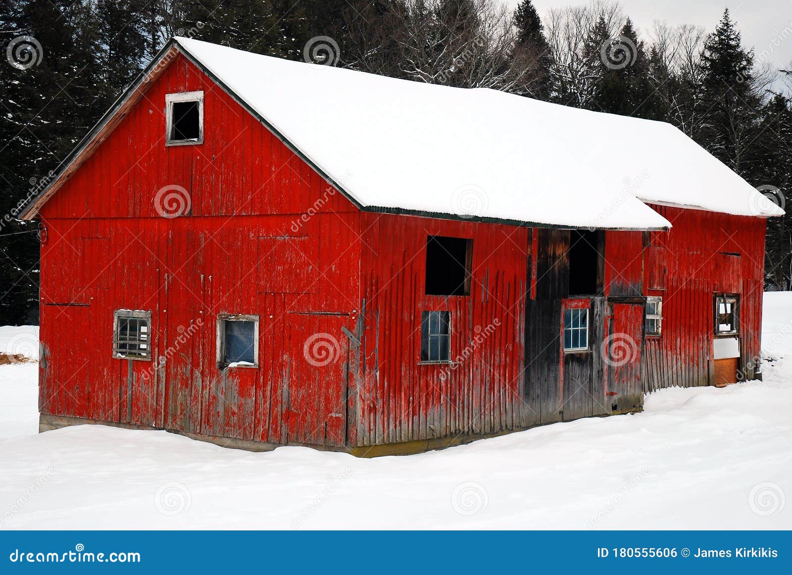 A rustic red barn in snow editorial photo. Image of farm - 180555606