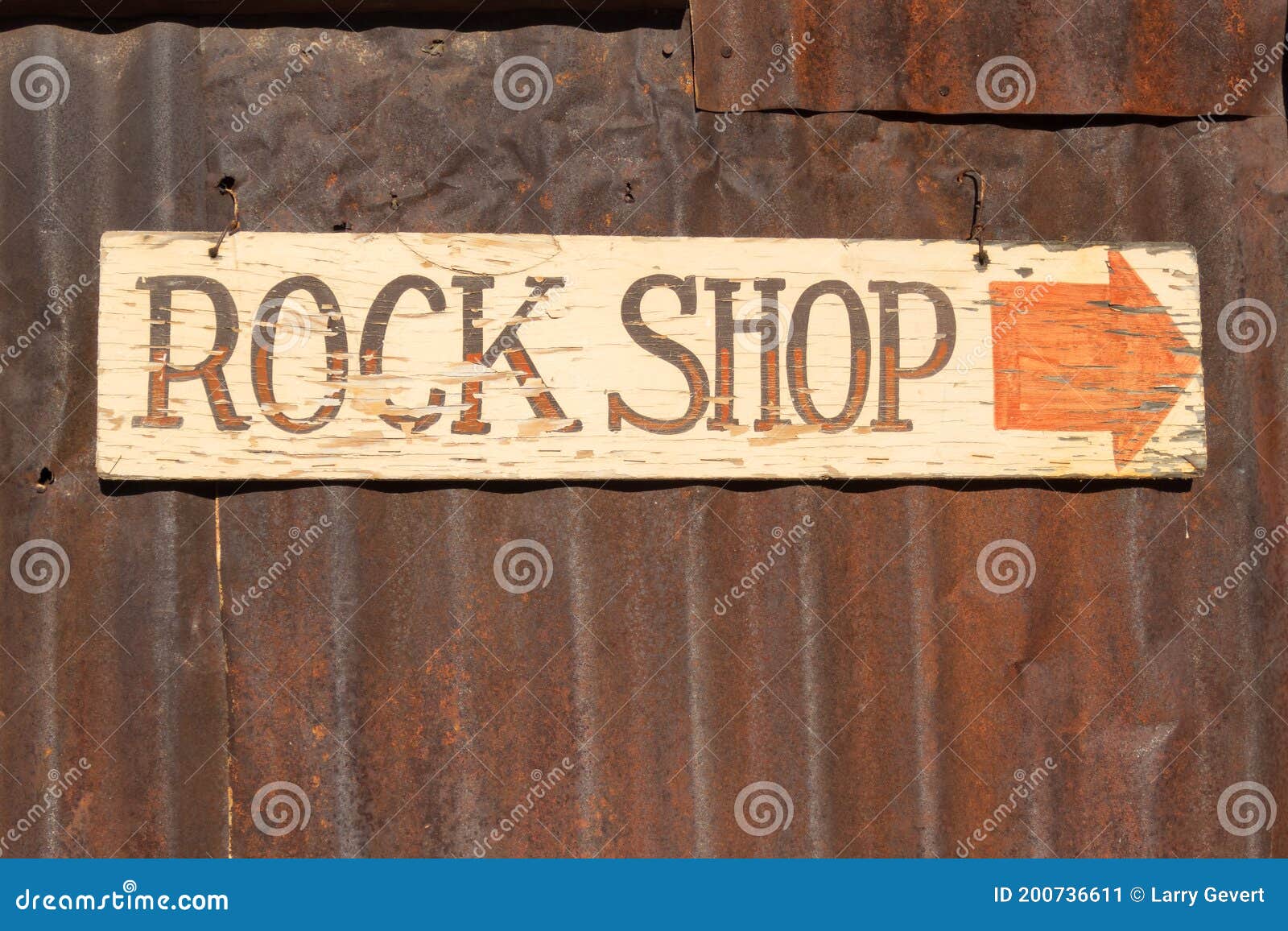 Rustic rock shop sign stock image. Image of detail, joints - 200736611
