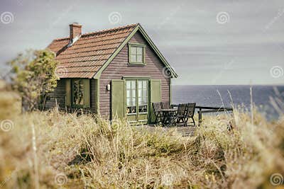 Rustic seaside cottage stock photo. Image of building - 44753484
