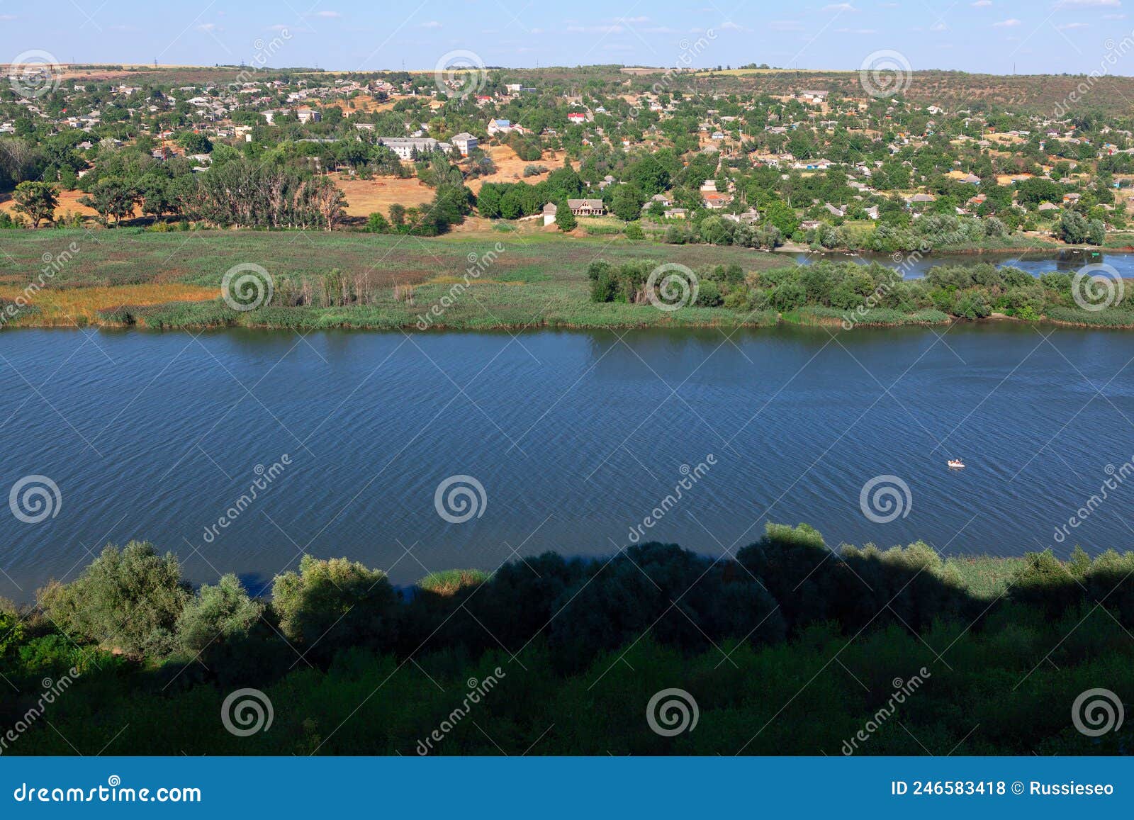 Rustic Settlement at Riverside Stock Photo - Image of riverside, meadow ...