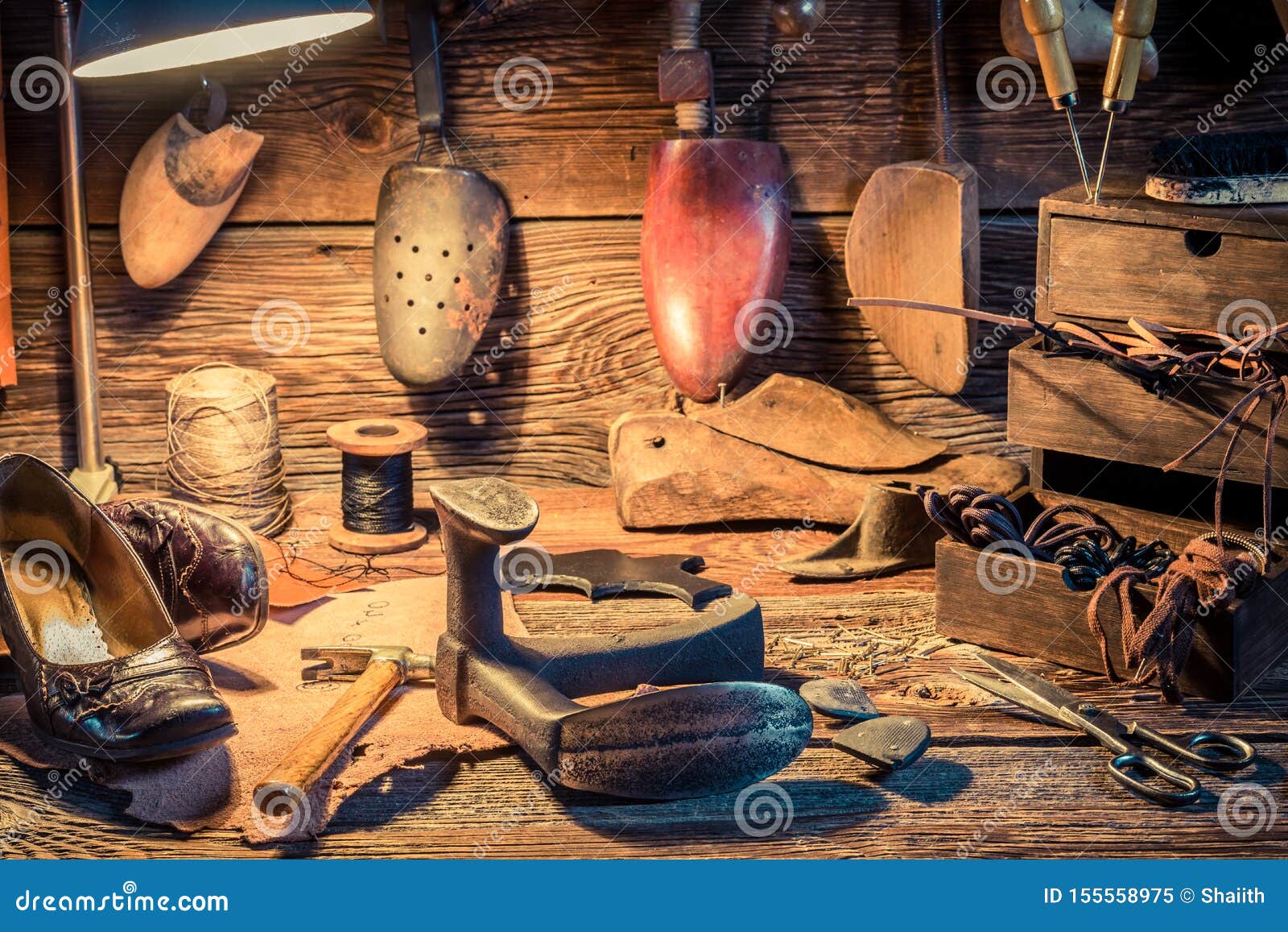 Rustic Shoemaker Workshop with Shoes and Laces Stock Image - Image of ...