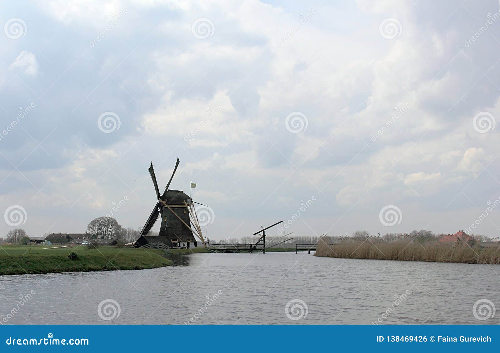 Rustic Spring Landscape with Dutch Windmill Stock Photo - Image of ...