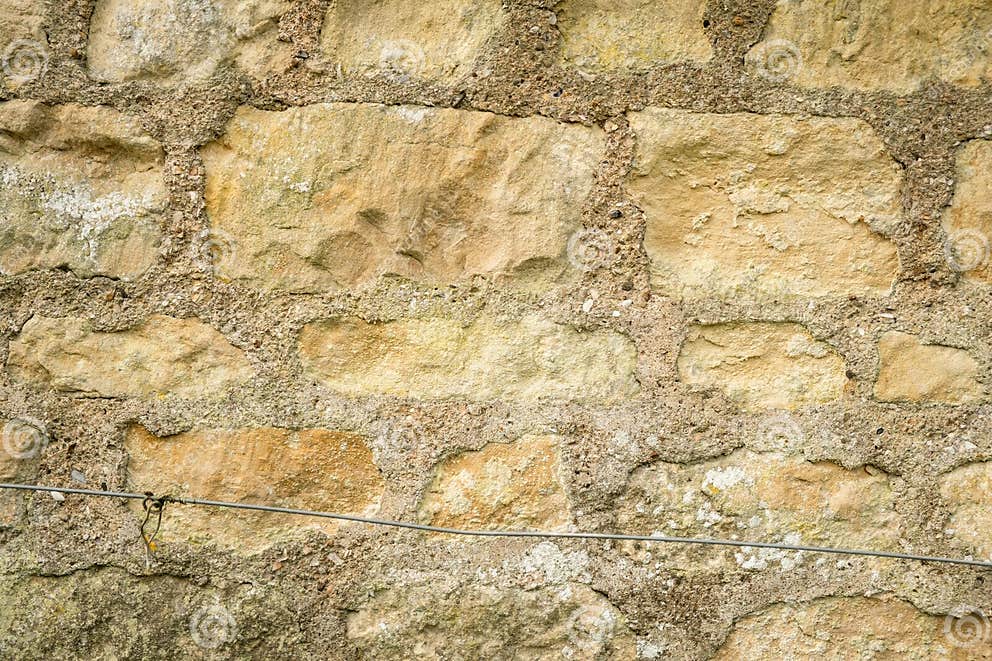 Rustic Stone Wall Background with Weathered Texture and Visible Mortar ...