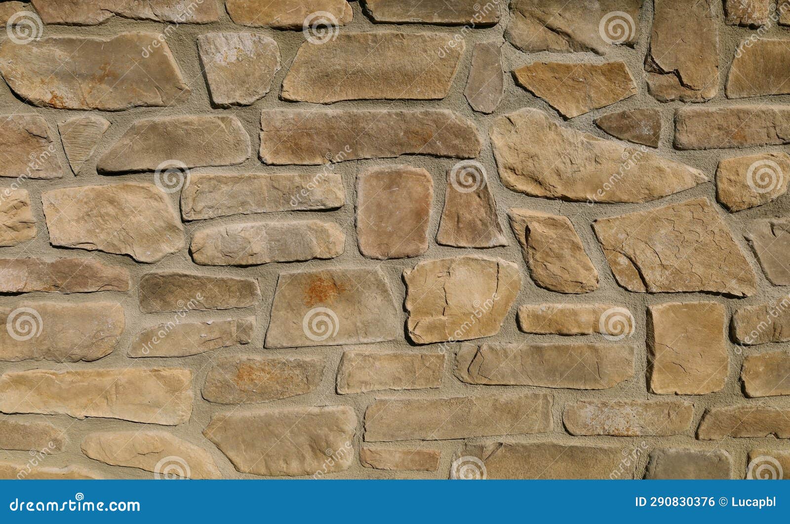 Rustic Stone Wall with Brown Rocks of Different Shapes and Sizes on ...