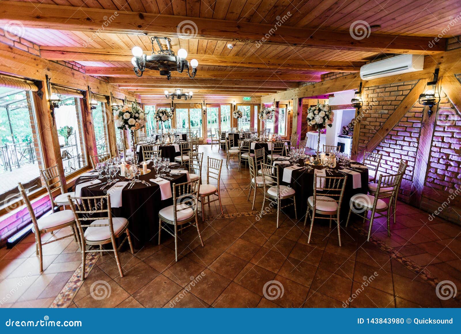 Rustic style banquet hall stock photo. Image of decorated - 143843980