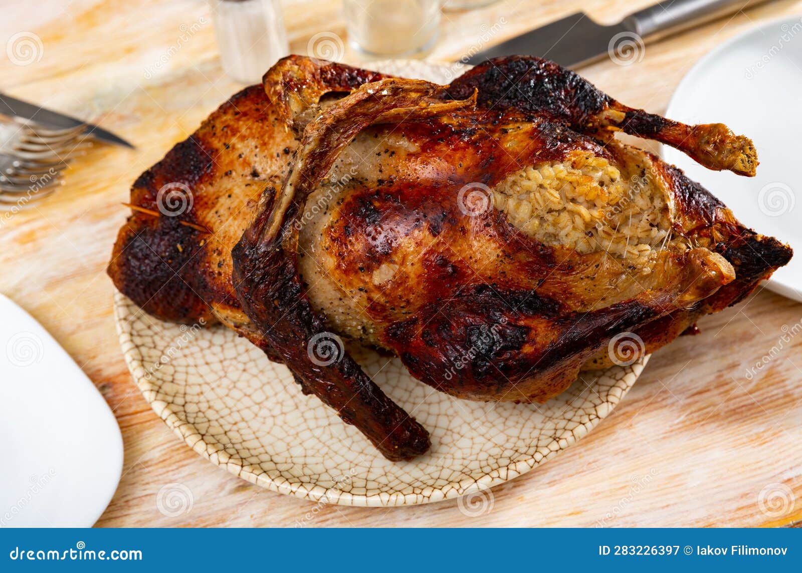 Rustic Style Roasted Goose Stuffed with Barley on Plate Stock Image ...