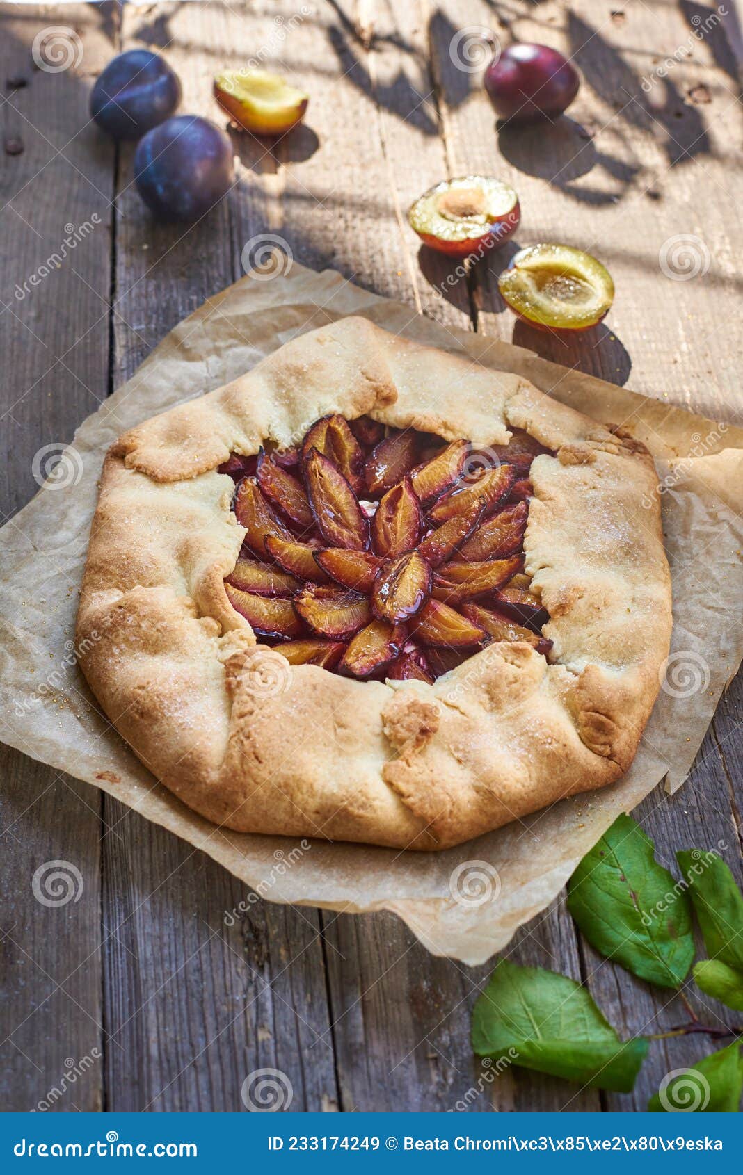 Rustic tart with plums stock image. Image of table, sunny - 233174249