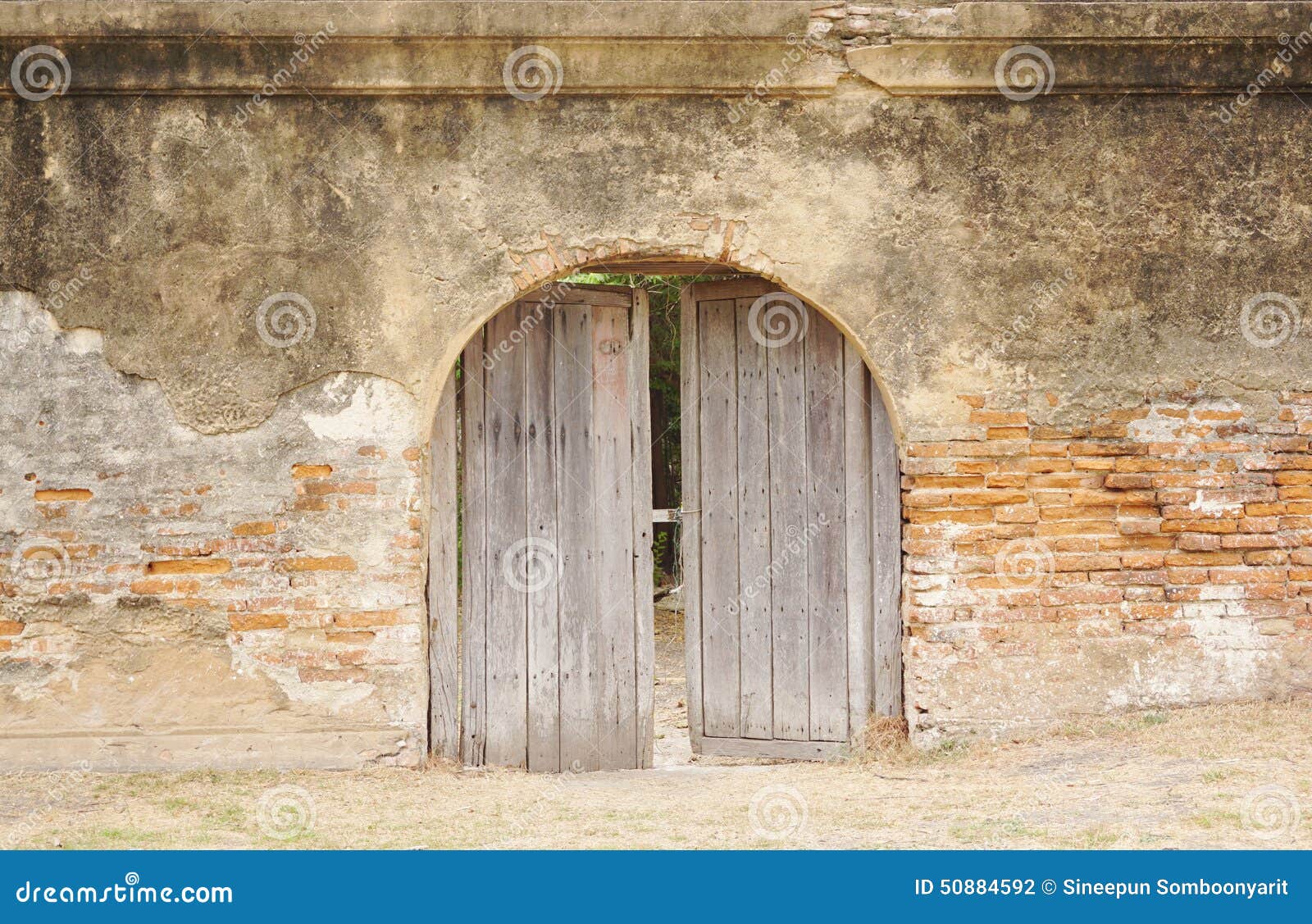 Rustic timber arch door stock photo. Image of wall, boundary - 50884592