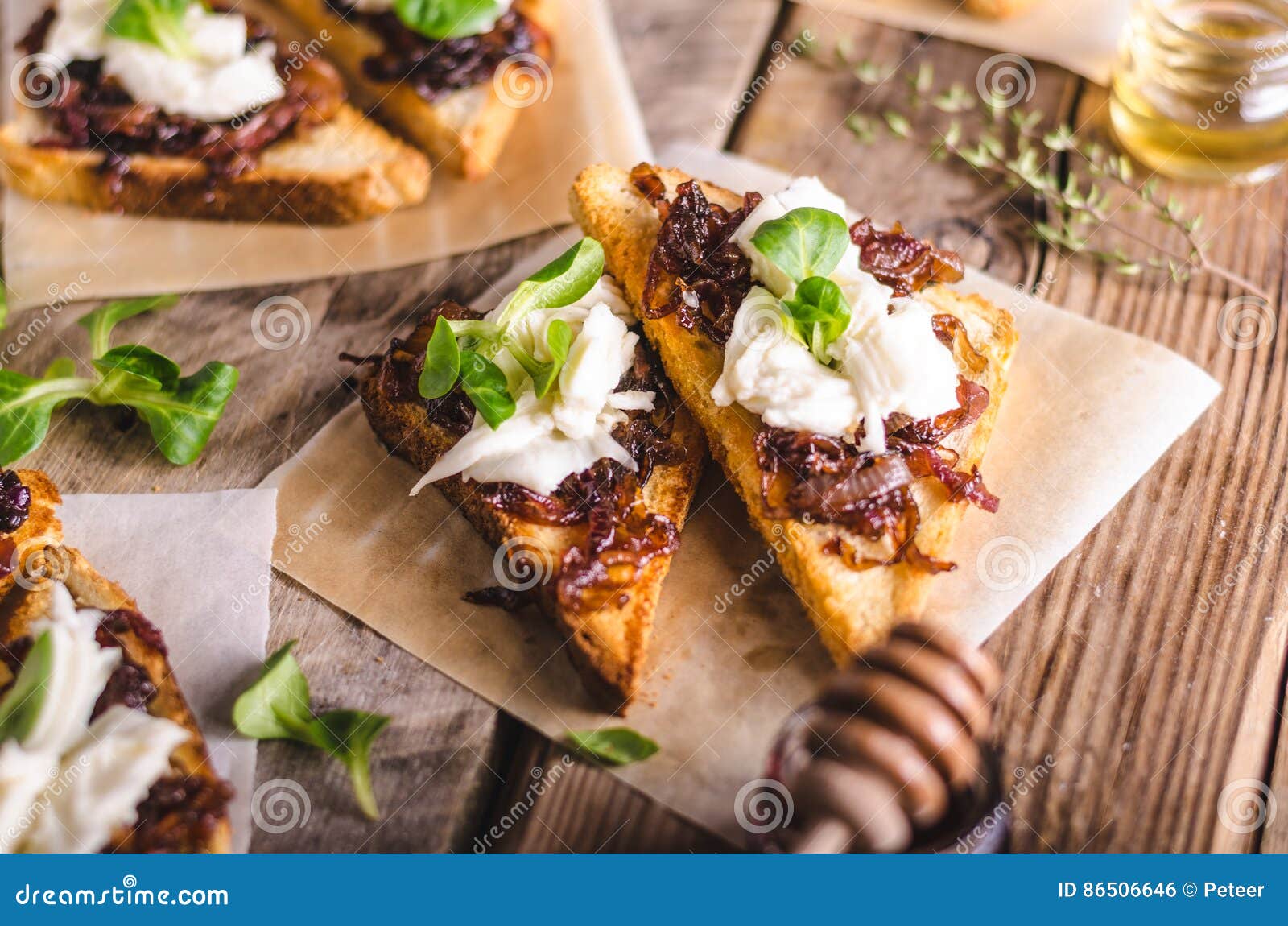 Rustic Toast with Caramelized Onion and Goat Cheese Stock Photo - Image ...