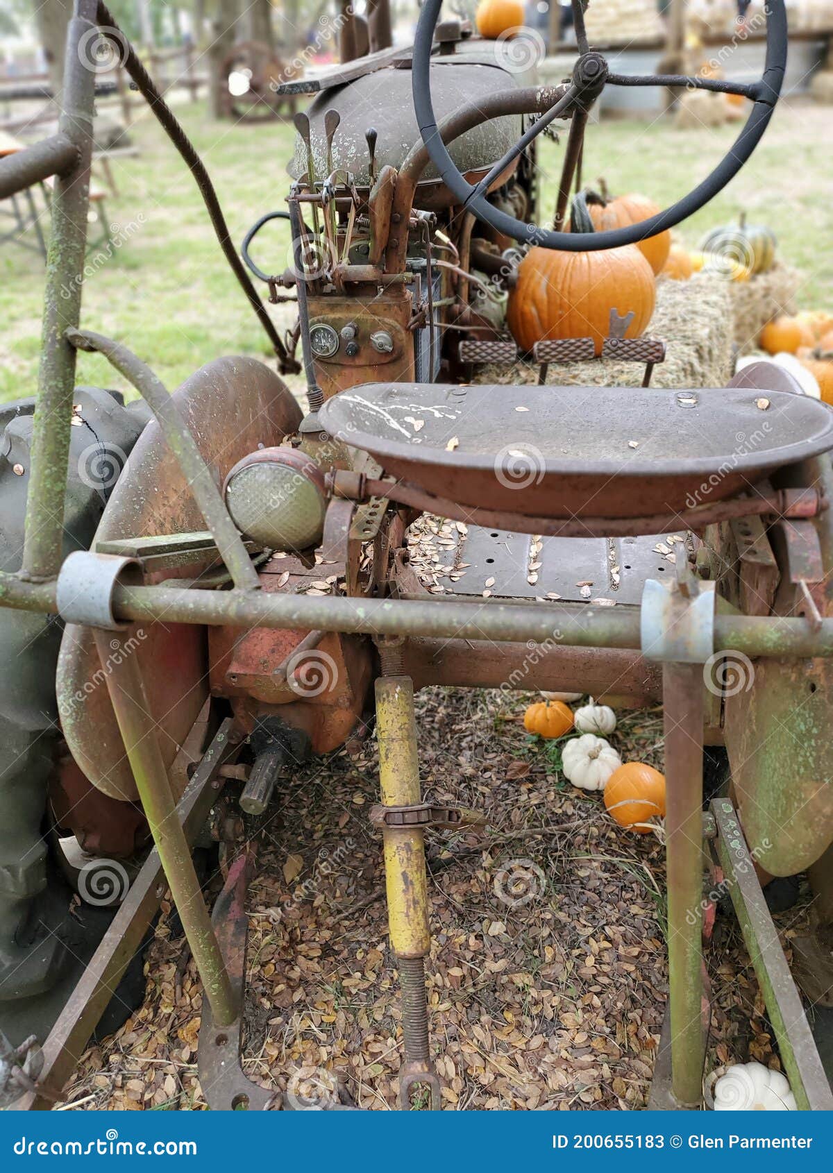 Rustic Tractor in Fall stock image. Image of machine - 200655183
