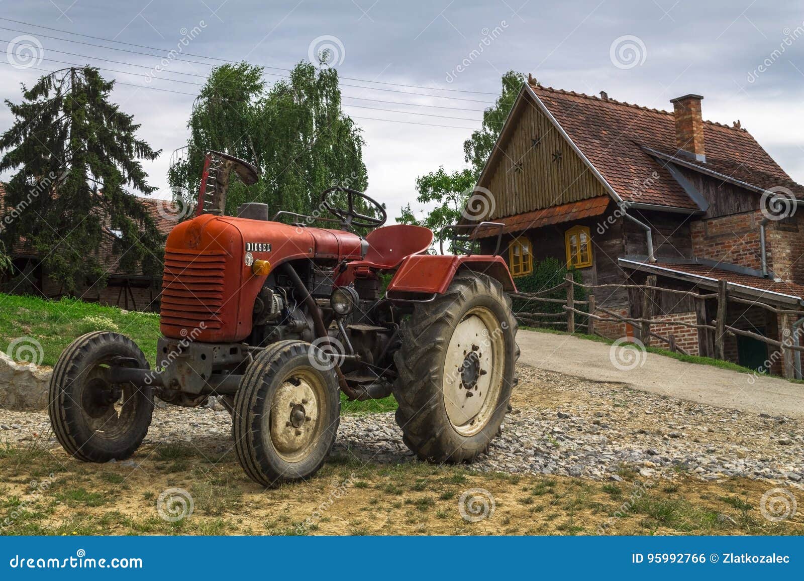 Rustic tractor and house stock photo. Image of house - 95992766