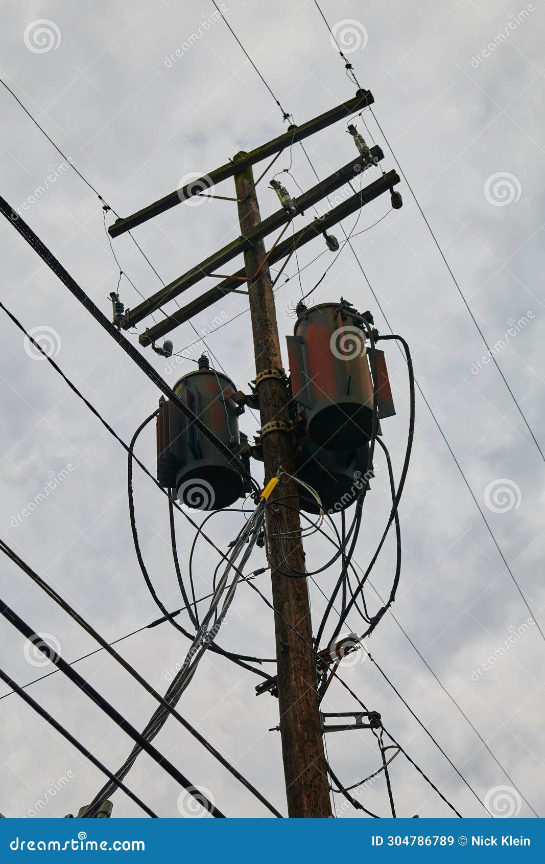 Rustic Utility Pole and Transformers, Cloudy Sky Perspective Stock ...
