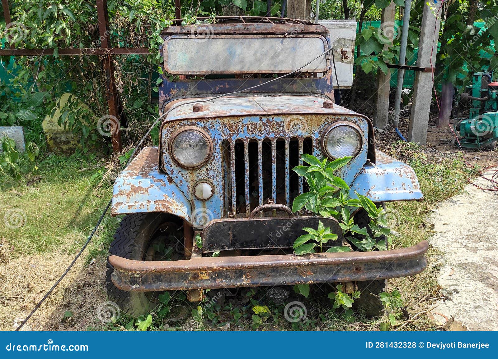 An Old and Rusty Abandoned Vehicle on the Garden Editorial Stock Photo ...