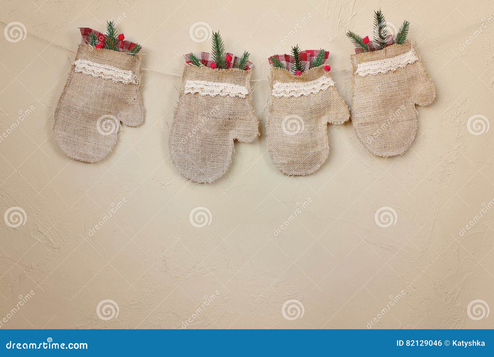 Rustic Vintage Christmas Mittens Gloves on Plaster Background. Stock ...