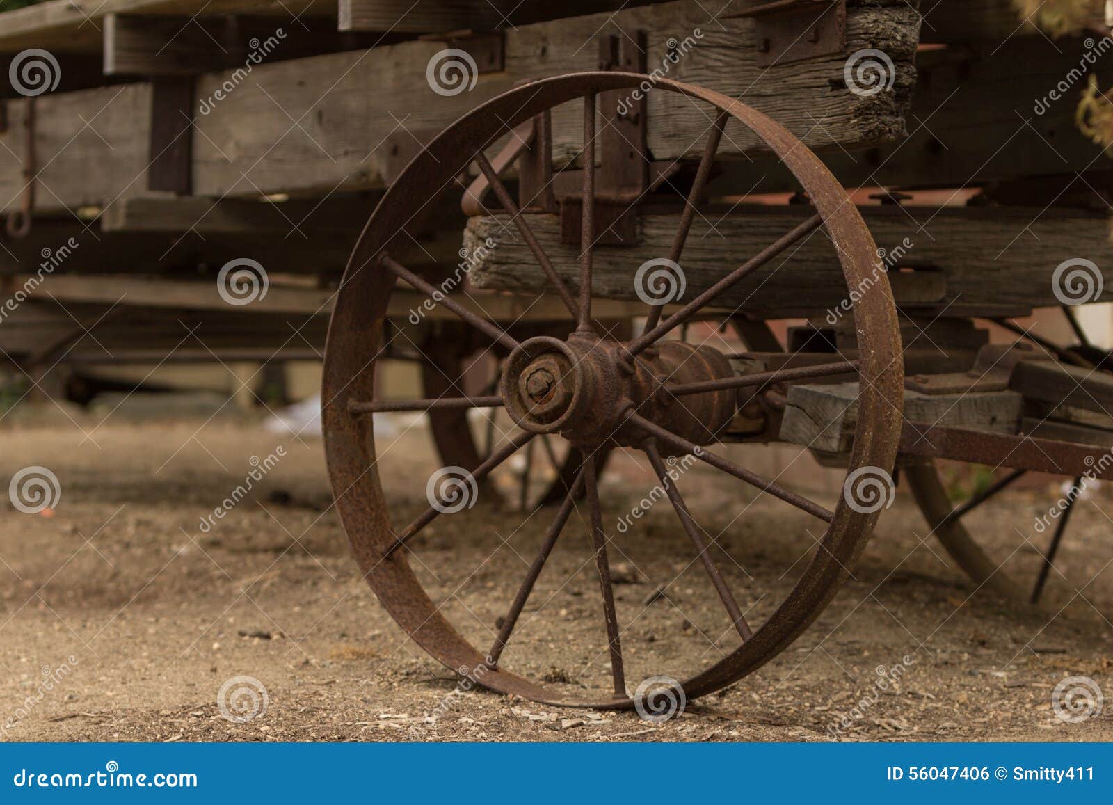 Rustic wagon wheel stock photo. Image of rusty, obsolete - 56047406