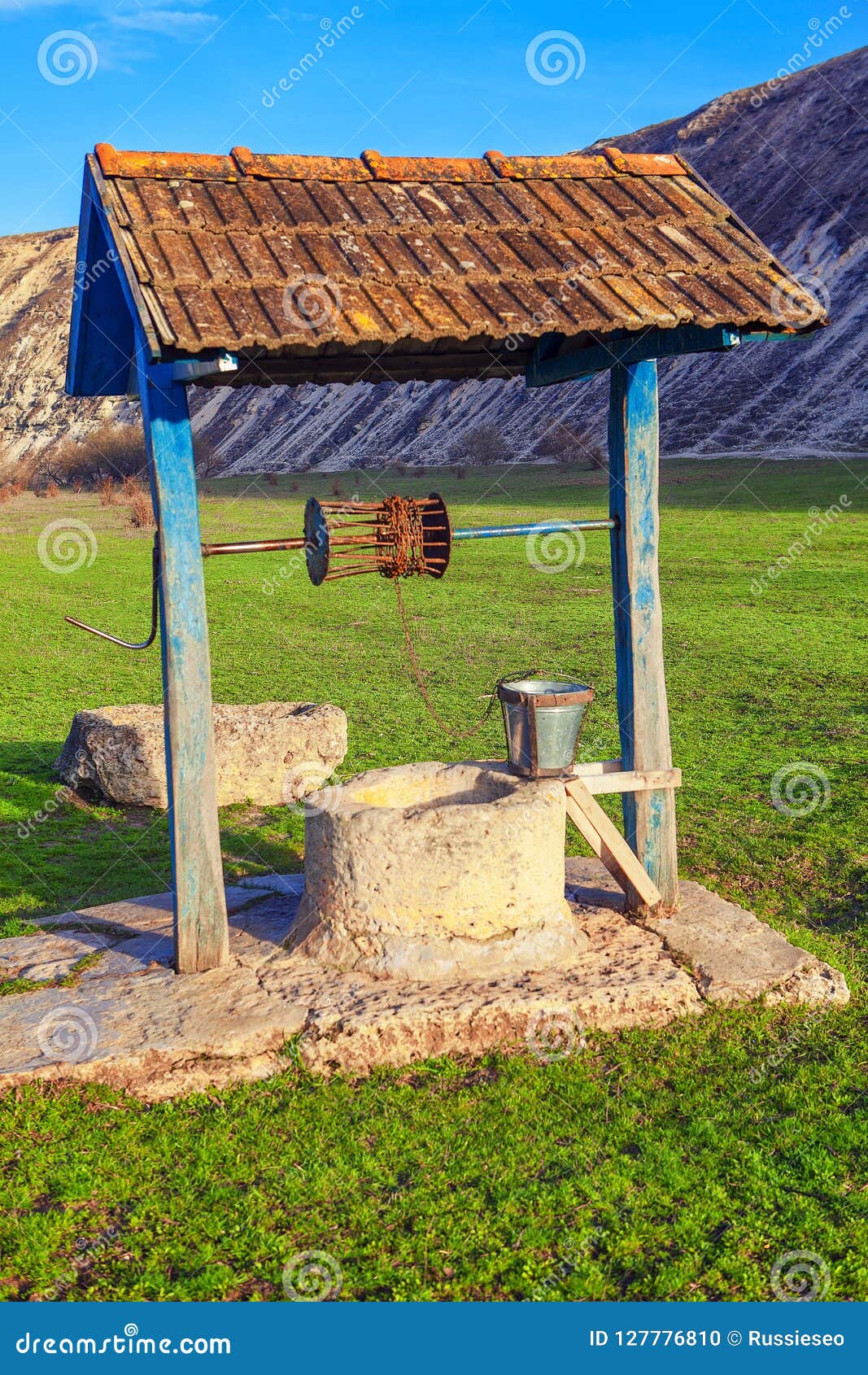Rustic water well stock photo. Image of farmland, village - 127776810