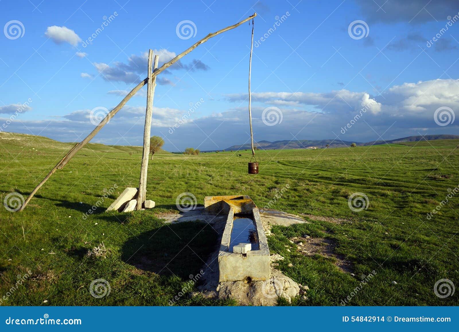 Rustic well stock photo. Image of crane, village, green - 54842914