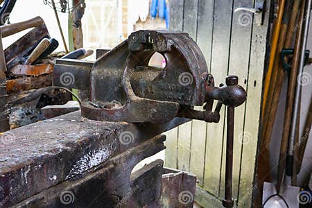 A Rustic, Well-used Bench Vice in an Old Workshop Captures the Timeless ...