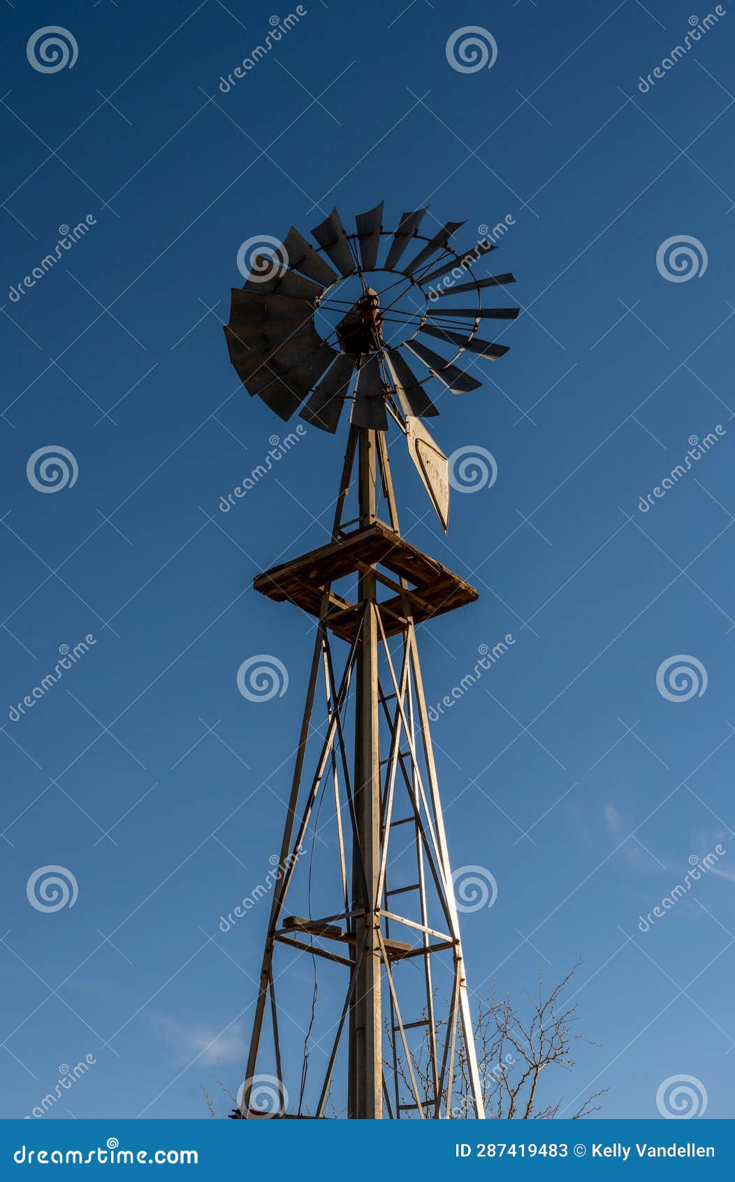 Rustic Windmill Against Blue Sky in Big Bend Stock Image - Image of ...