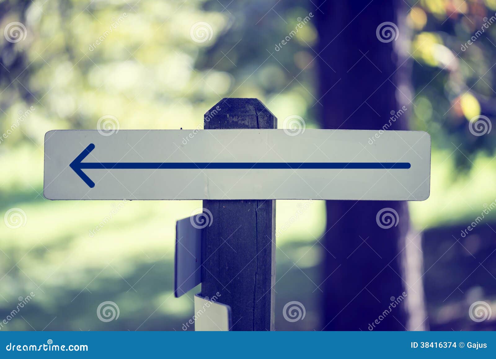 Rustic Wooded Signboard with a Left Arrow Stock Photo - Image of pole ...