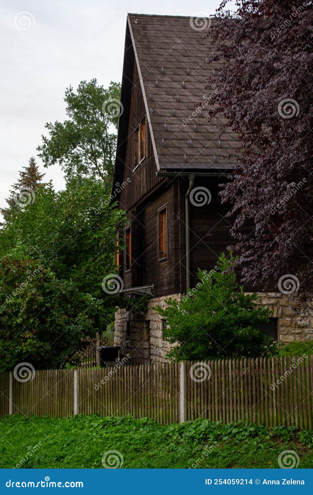 Wooden House in the Alpine Forest at the Foot of the Mountains Stock ...